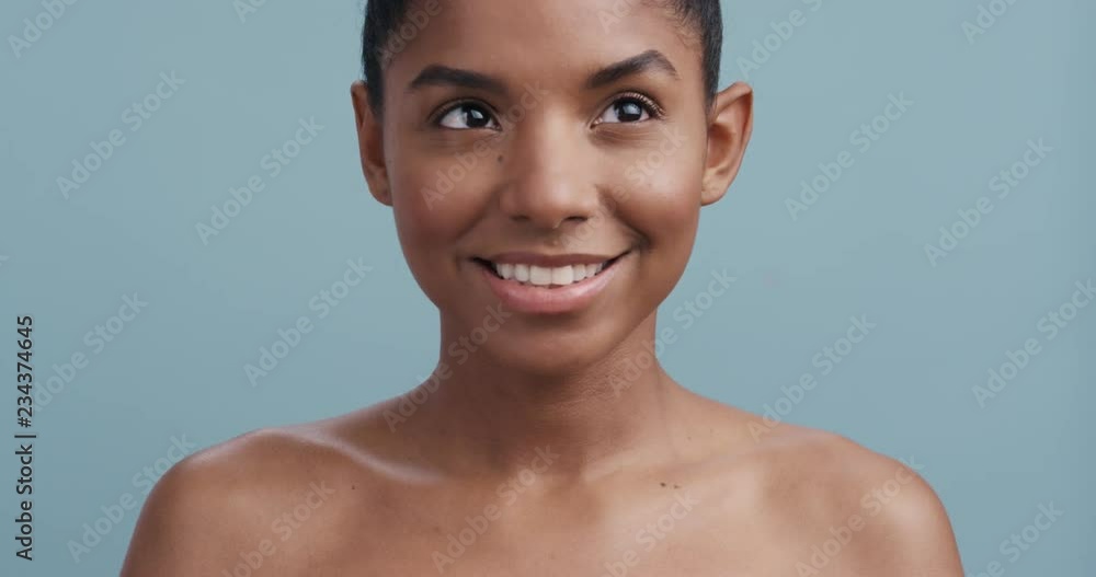 slow motion beauty portrait beautiful woman smiling feathers falling on ...