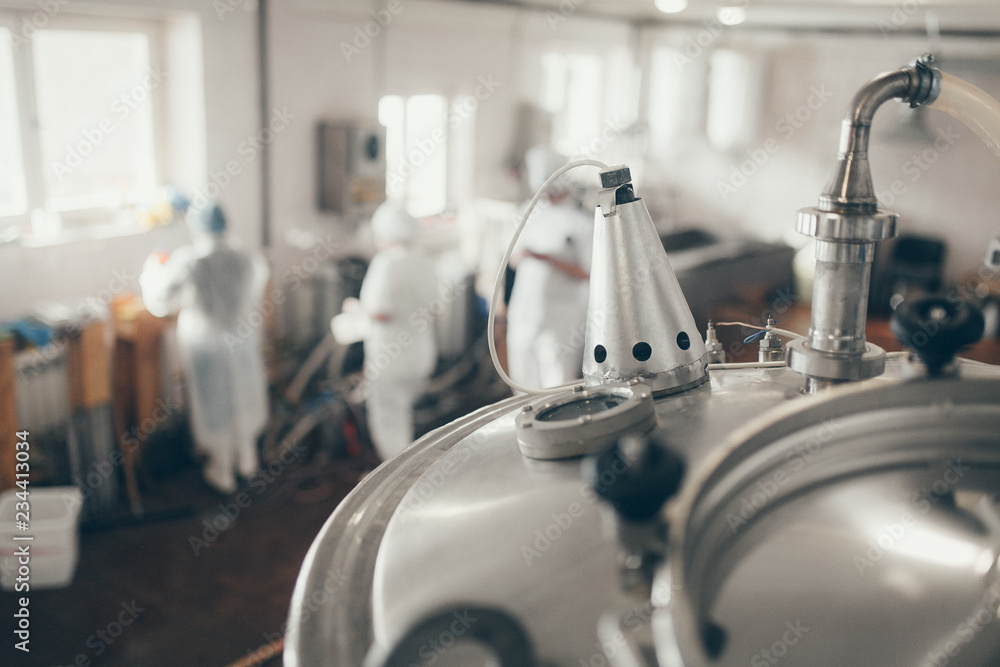 Production of milk and yogurt at the plant. Metal units and tanks for ...