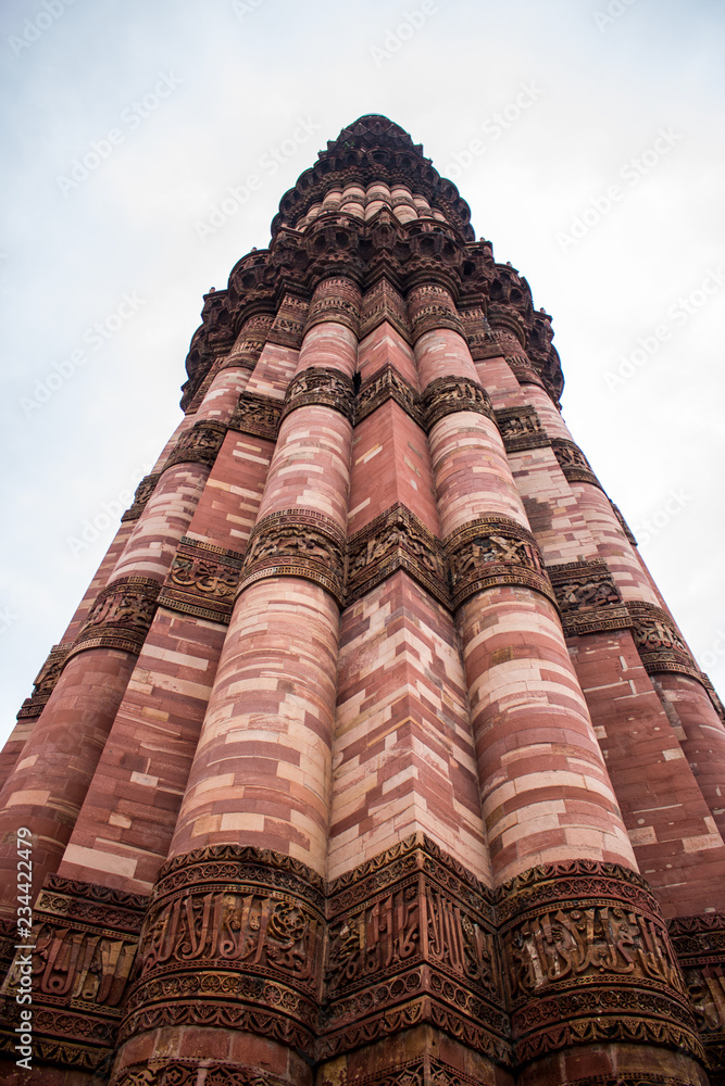 Qutub Minar, 73-meter tall tapering tower of five storeys, started ...