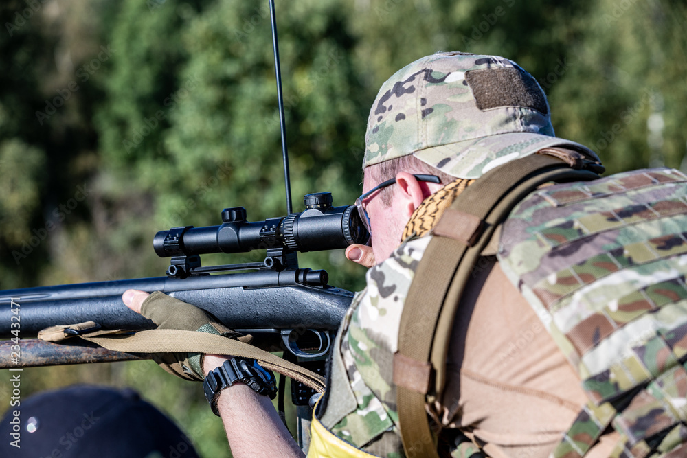 special forces, soldier assault rifle with silencer, optical sight ...