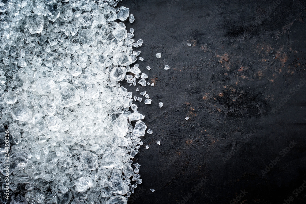 Artificial crashed ice offered as top view on old rustic metal sheet ...