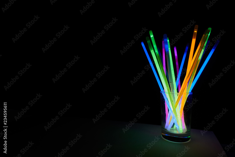 Arrangement of multi-colored glow sticks Stock Photo | Adobe Stock