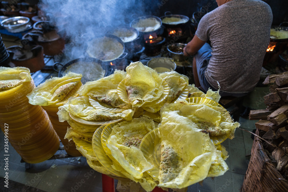 Banh xeo, Vietnamese traditional street food yellow crispy rice flour ...