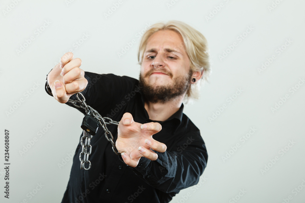 Sad man with chained hands, no freedom Stock Photo | Adobe Stock