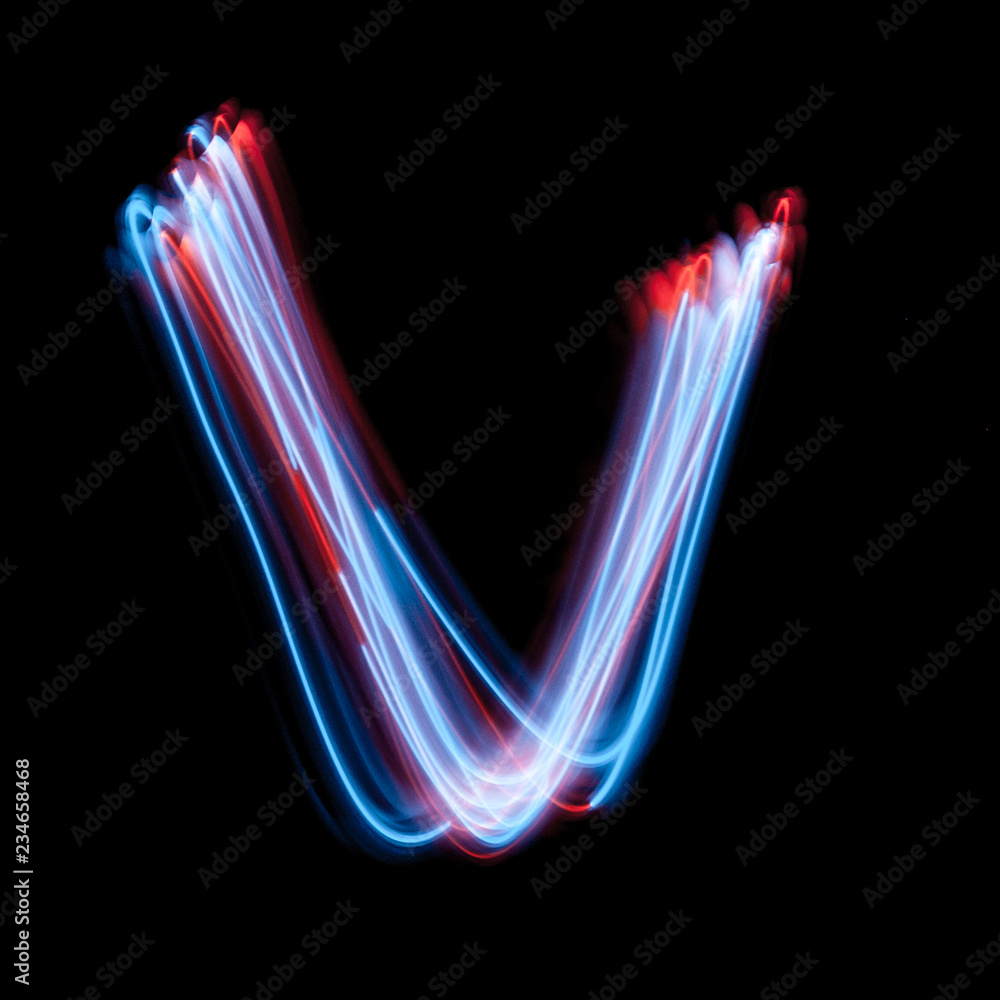 Letter V of the alphabet made from neon sign. The blue light image ...