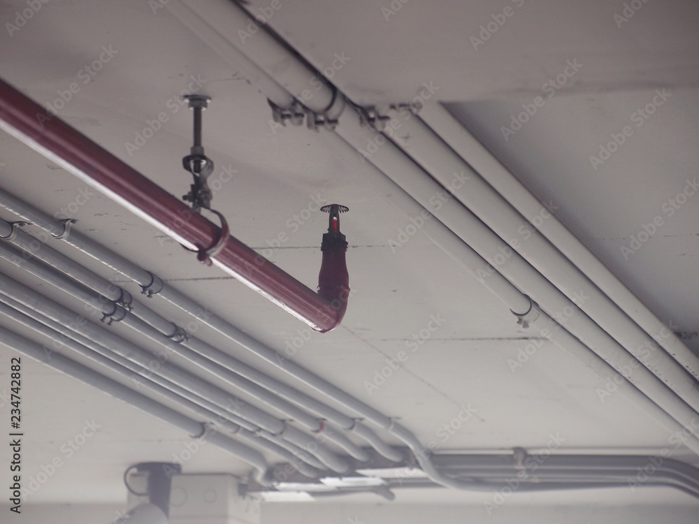 Automatic Fire Sprinkler in red water pipe System Stock Photo | Adobe Stock