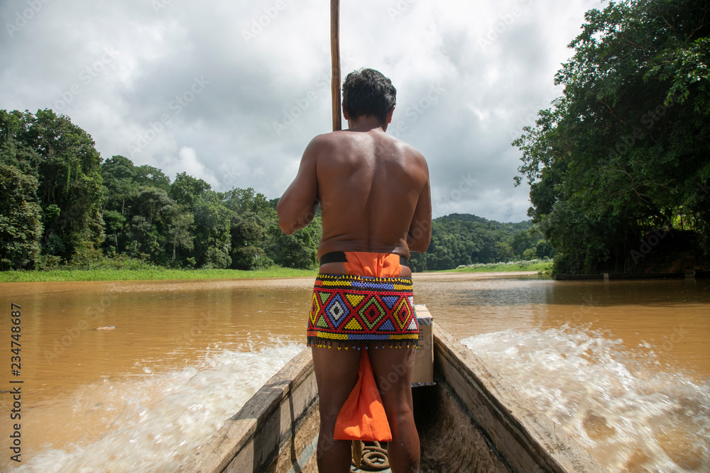 Indigenous Embera in boat crossing the river, Gamboa Panama Stock Photo ...