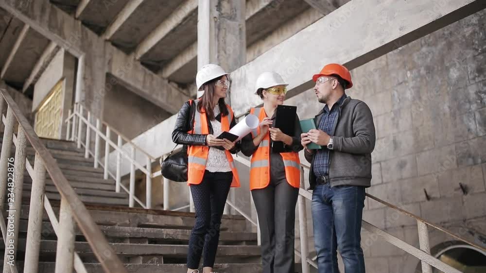 Chief engineer on site discussing construction issues with the customer ...