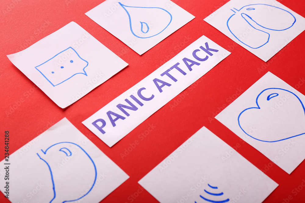 Paper cards with different drawings and text PANIC ATTACK on color ...