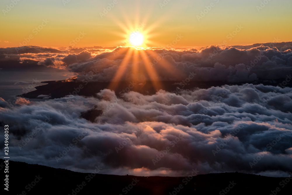 Beautiful Colorful Sunset Sky at Dusk with Sun Rays Coming Through Clouds from the Top of ...