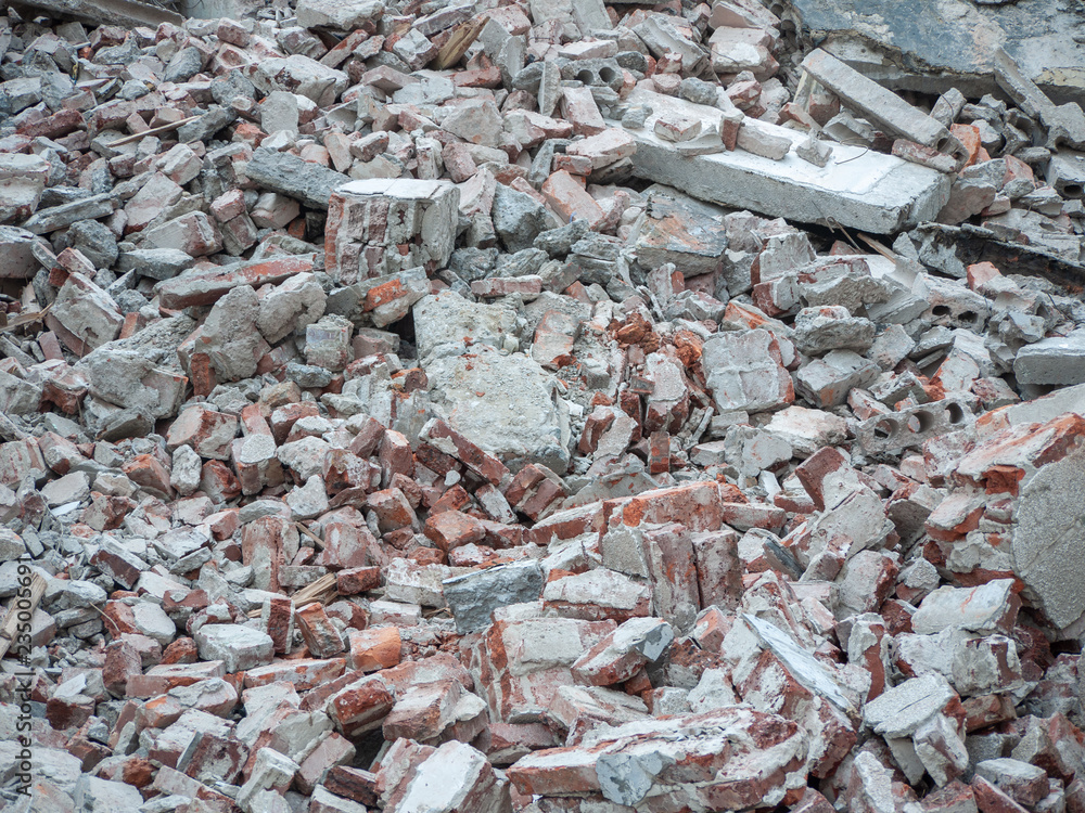 Rubble of destroyed/demolished brick buildings. Stock Photo | Adobe Stock