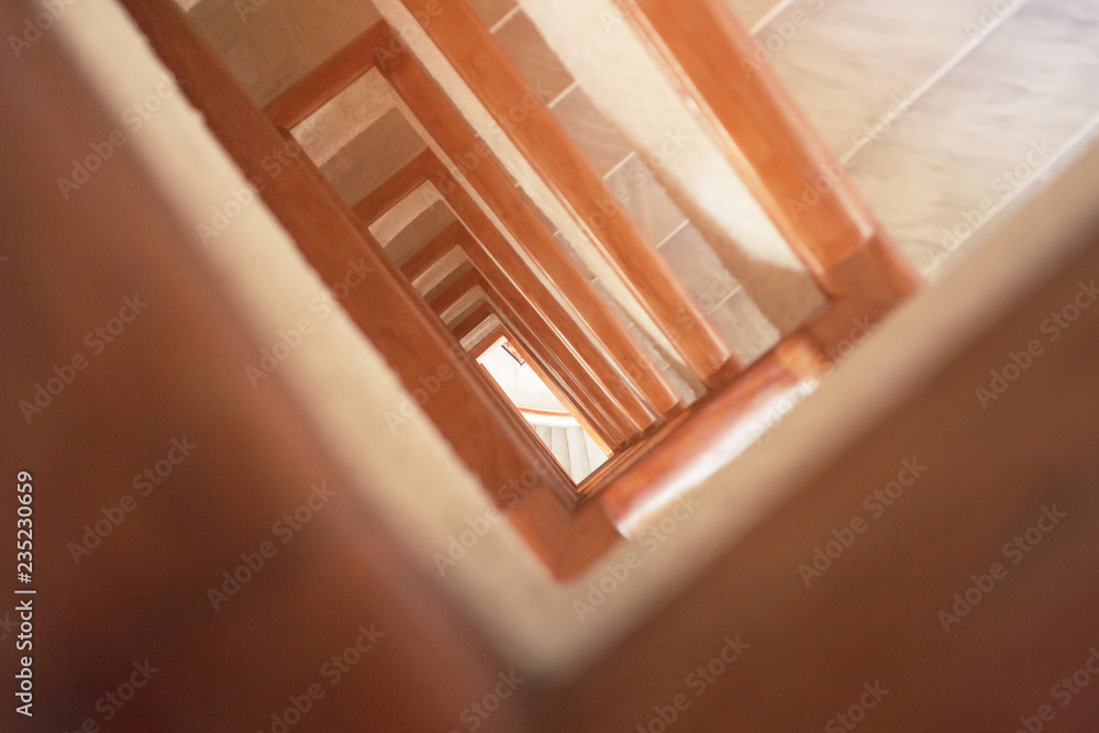 Steps and railings in the frame. The lonely spiral stairs in the hotel ...