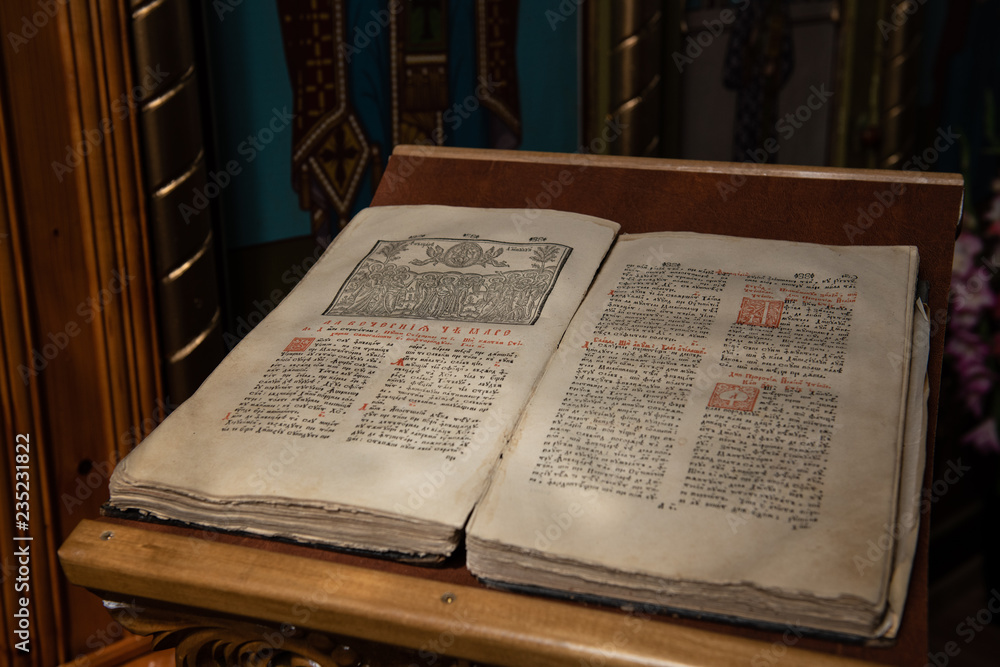 Old Christian manuscript written in Cyrillic on church pulpit. Stock ...