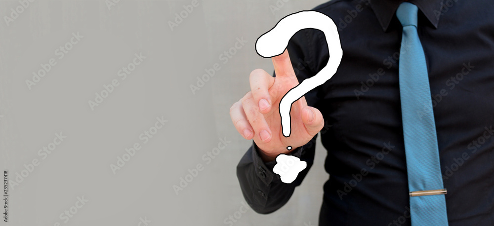 Foto de Man touching question mark with tip of his finger. Innovation ...