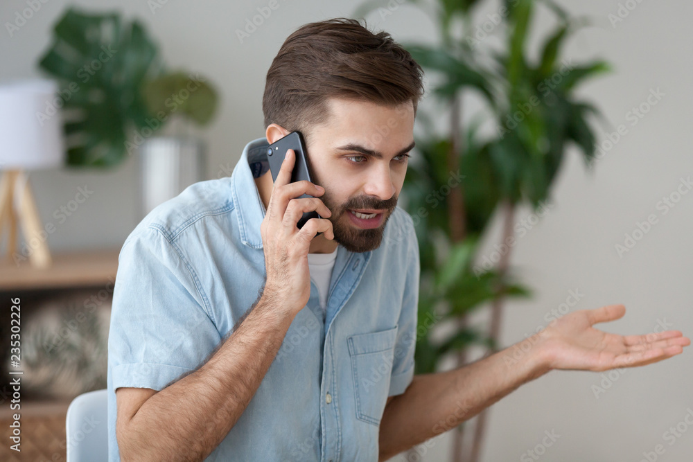 Angry Man Talk On Smartphone Arguing Or Solving Problem Irritated Male