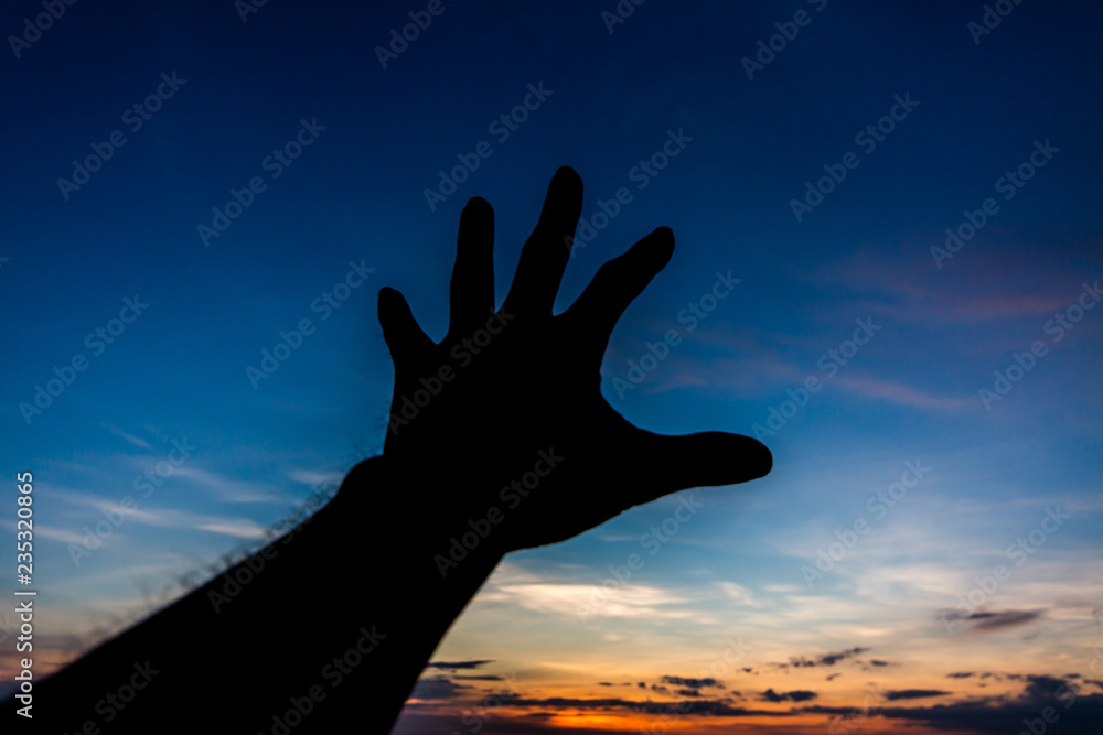 Hand Reaching For Sky