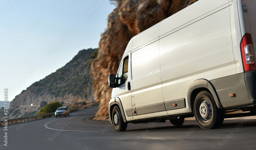delivery truck van rush by country road Stock Photo | Adobe Stock