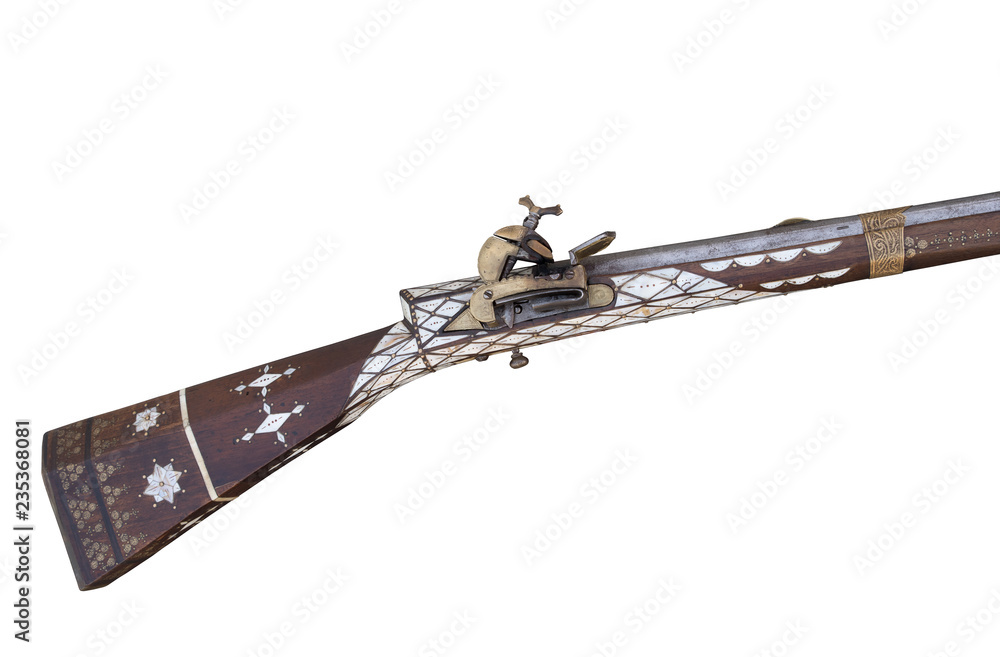 Ancient musket isolated. ld flintlock rifle. Stock Photo | Adobe Stock
