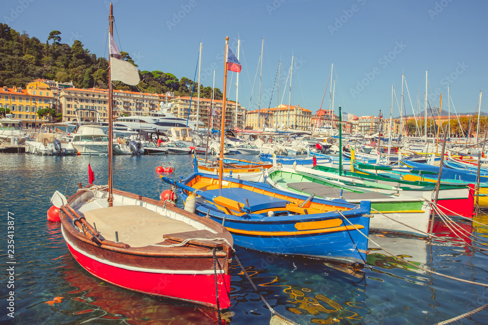 Bright colored boats in the port of Nice, France Photos | Adobe Stock