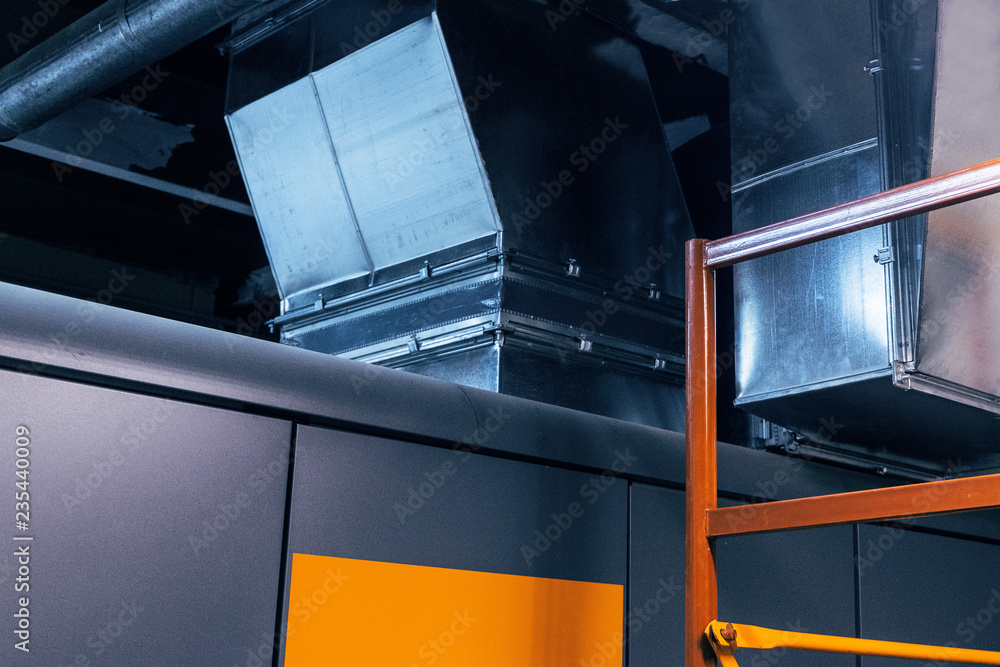 Close-up view of the modern big dimensions ductwork installed on the ...