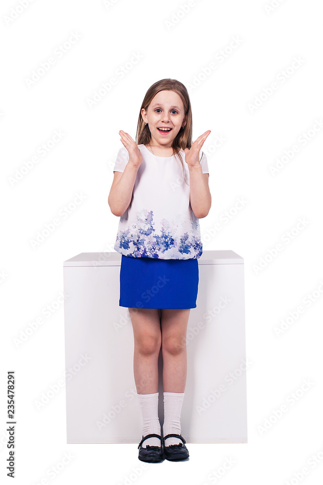 cute little girl is very happy. Isolated on white. Stock Photo | Adobe ...