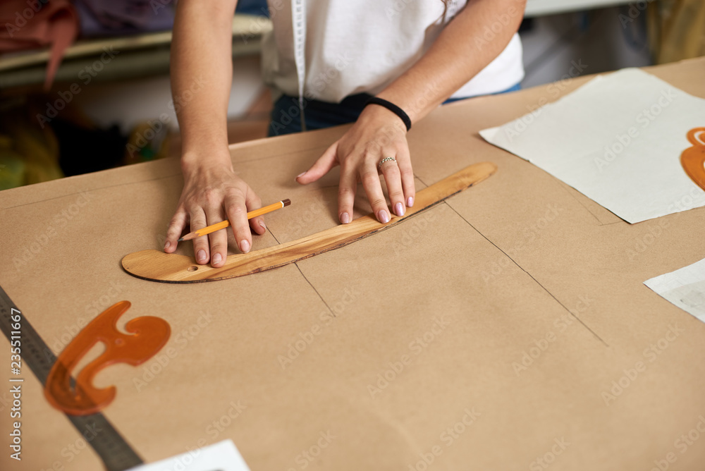 Working place in design studio. Female designer drawing flat paper ...