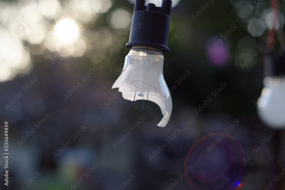 broken electric bulb outdoor Stock Photo | Adobe Stock