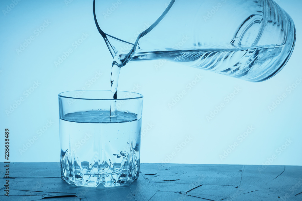 Pouring Pitcher Of Water