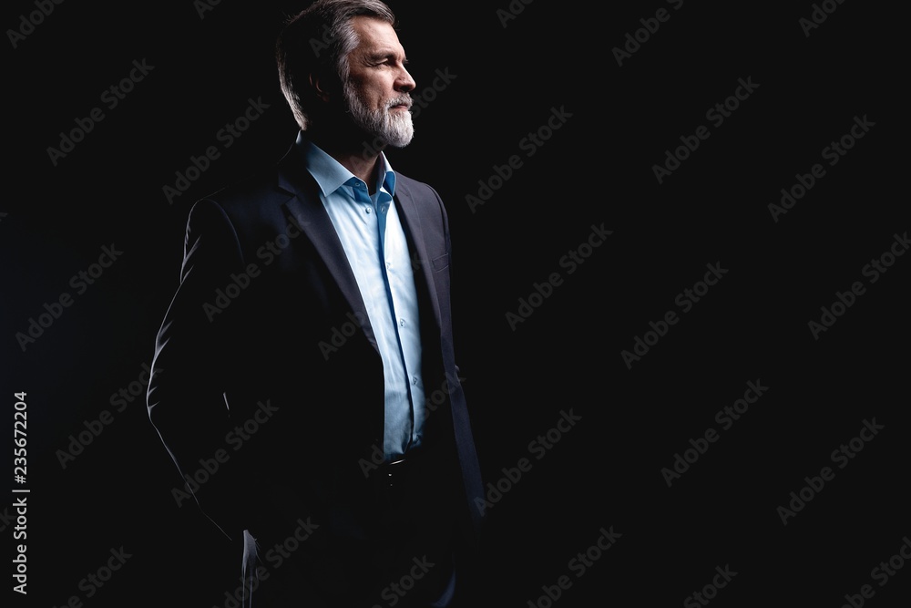 Handsome mature business man isolated on black background Stock Photo ... Handsome mature business man isolated on black background Stock Photo ...