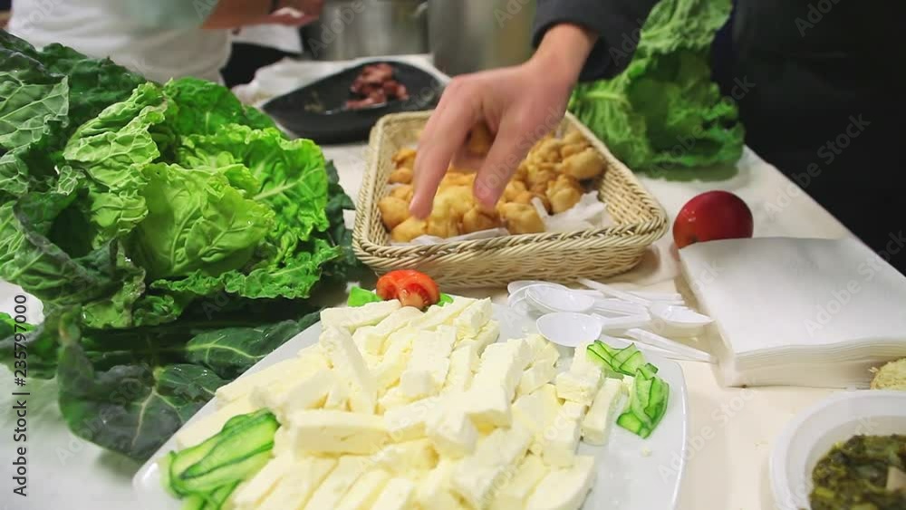 Homeless takes the cheese from the plate at homeless shelter. Serving ...