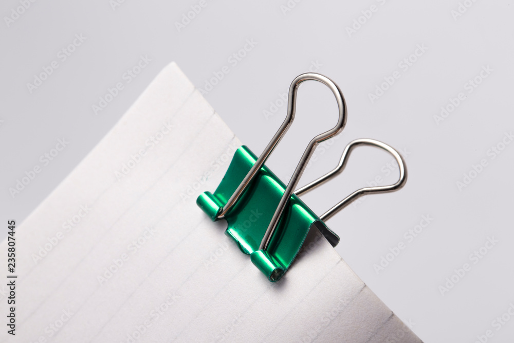 Double clips with different colors and note Stock Photo | Adobe Stock