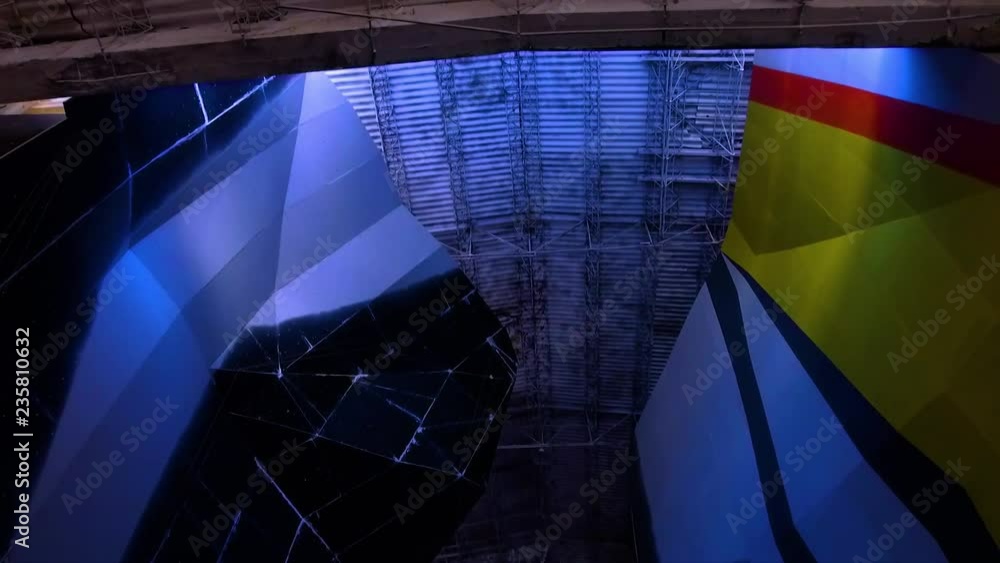 Night view of the interior of a building where a climbing wall is being ...
