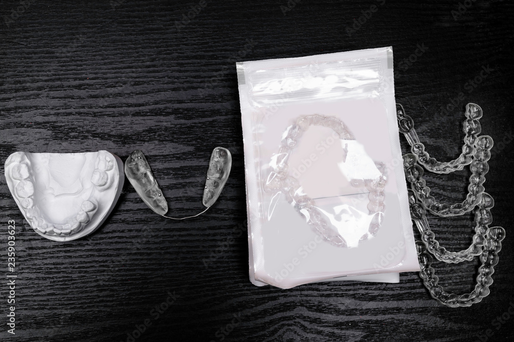 teeth alignment stages process, gypsum cast, different aligners in ...