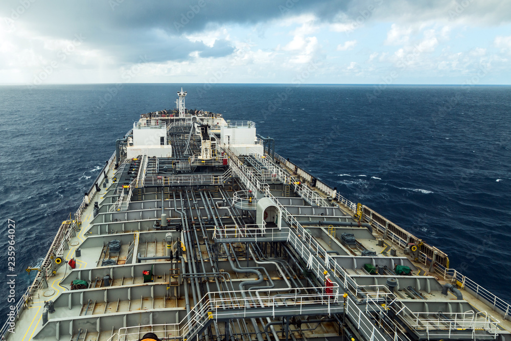 Oil tanker deck while rainy weather. View from the navigation bridge ...