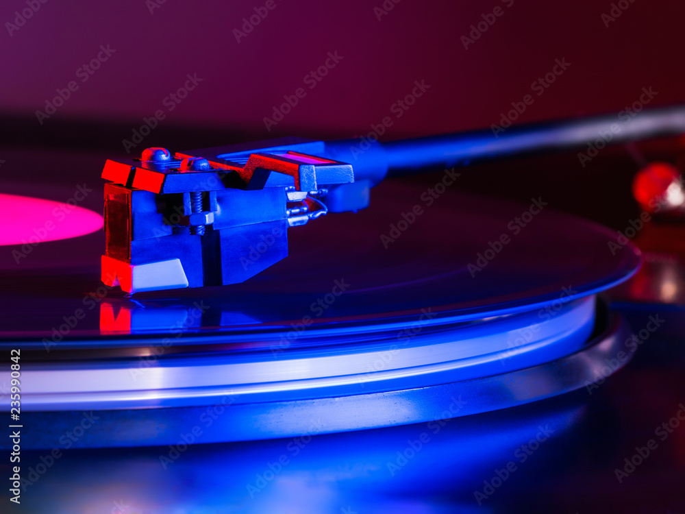 Cinemagraph, retro record vinyl player. Record on turntable. Top view ...