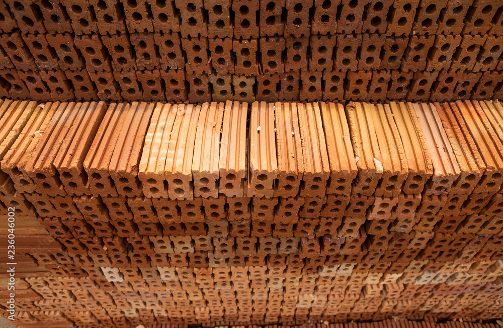 Stack of red brick at the construction site, outdoor day light ...