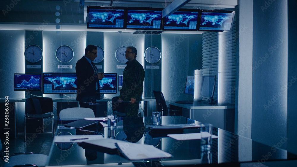 Federal Special Agent Talks To Military Man in the Monitoring Room. In ...