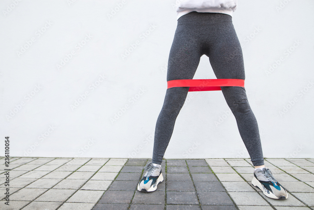 Close photo of beautiful muscular legs of a sports girl on the ...