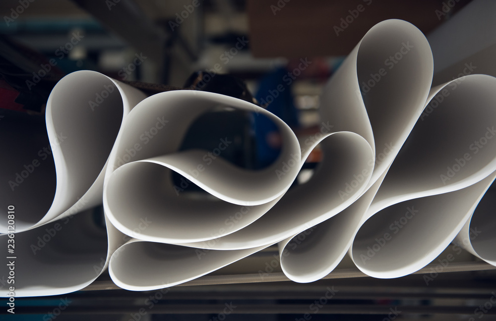 A beautiful smooth clean paper roll machine creating a continuous sheet ...