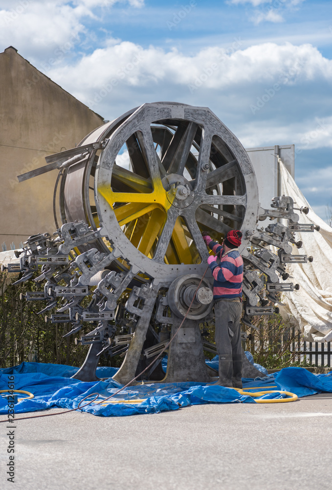 An old industrial steel and iron wallpaper manufacturing rolling ...