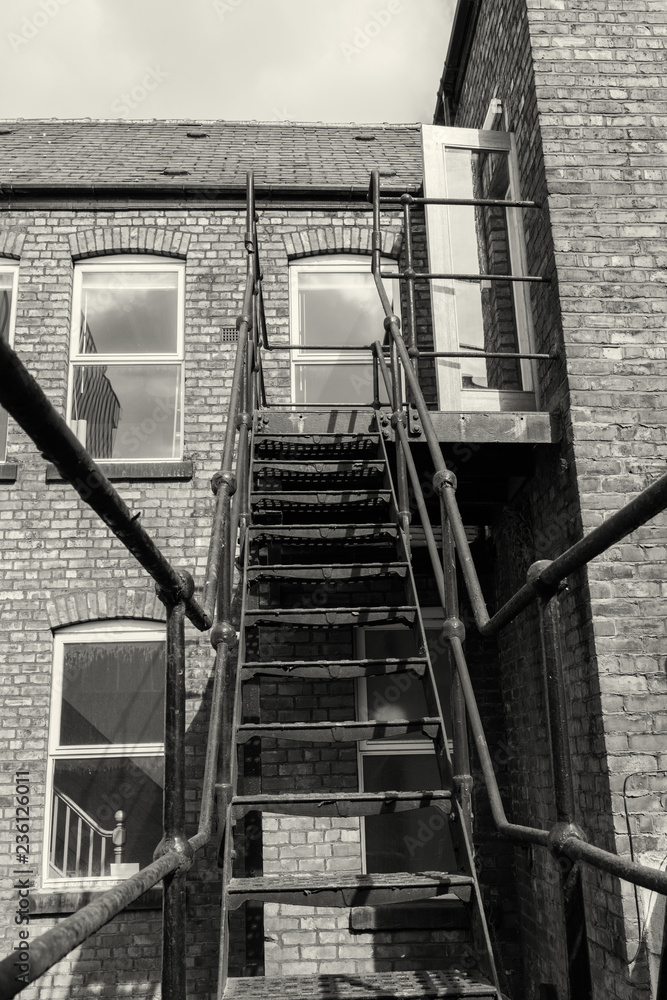 Urban New york style metal vintage steel fire escape ladder stairs in ...