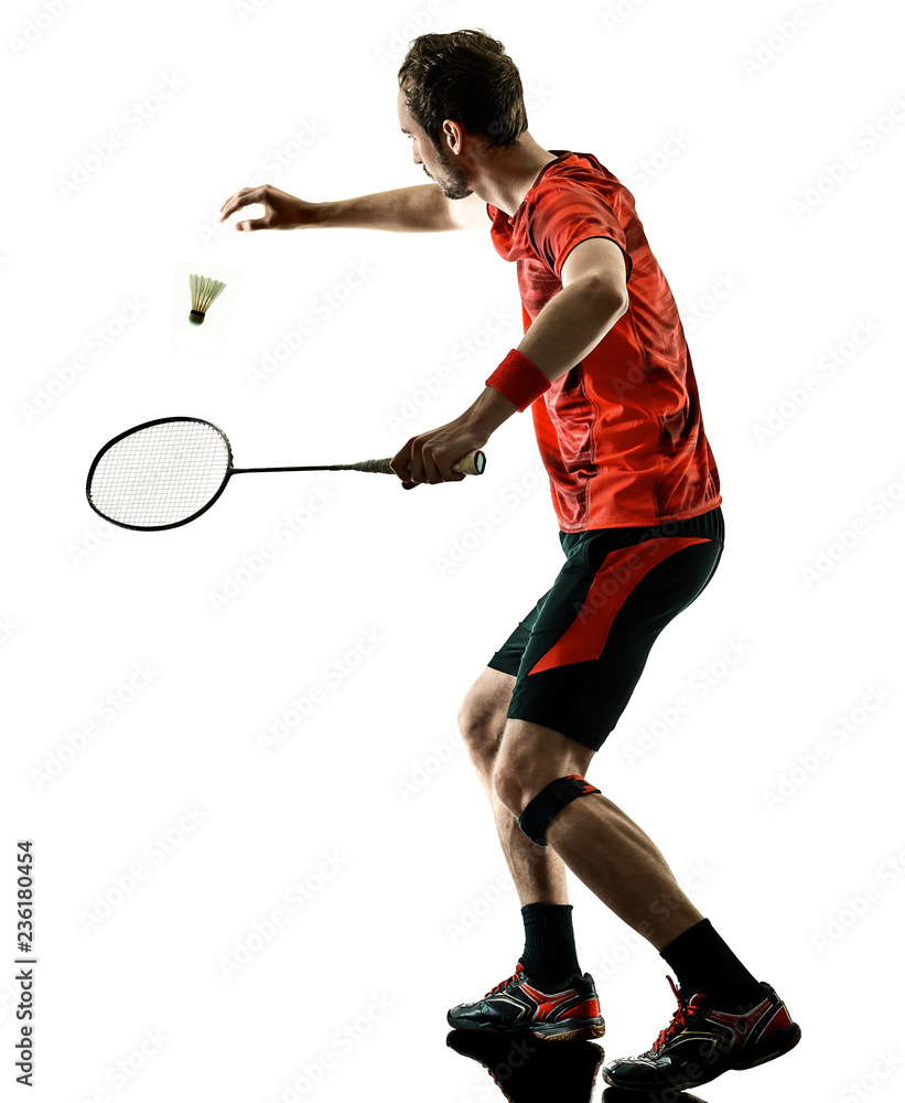 one caucasian Badminton player man in studio shadow silhouette isolated ...