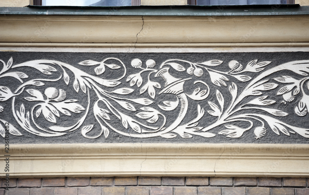 Decorative ornamental frieze with 19th century graffito in Prague ...