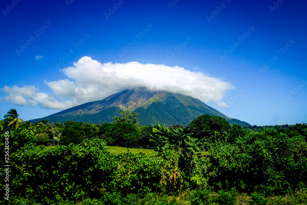 Cloud-capped Volcan Maderas on Ometepe Island in Lake Nicaragua Stock ...