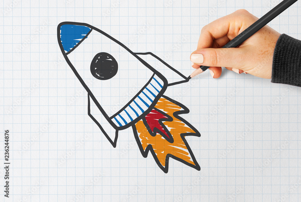 Hand drawing a rocket launch on a notebook paper Stock Photo | Adobe Stock