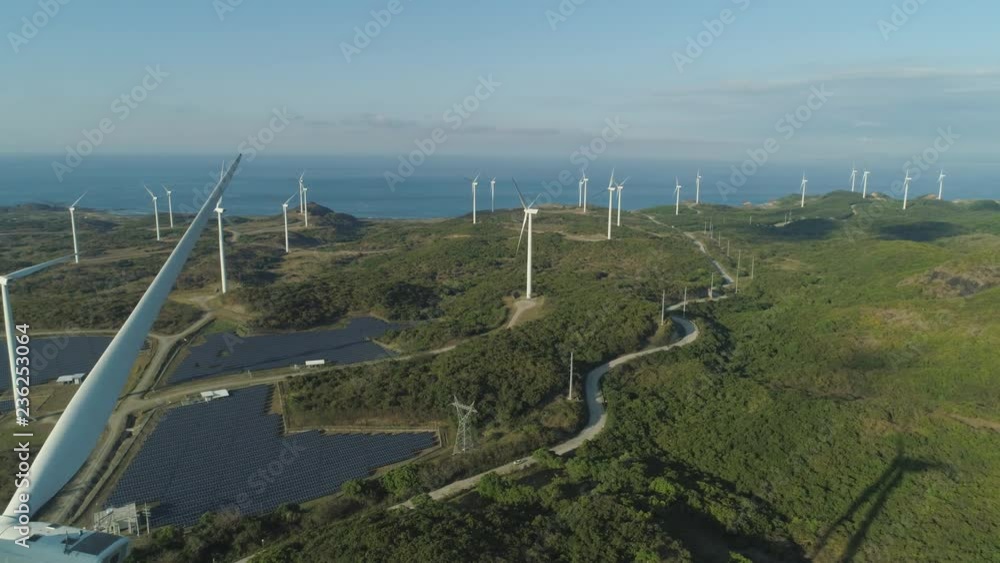 Aerial view of Windmills for electric power production on the seashore ...