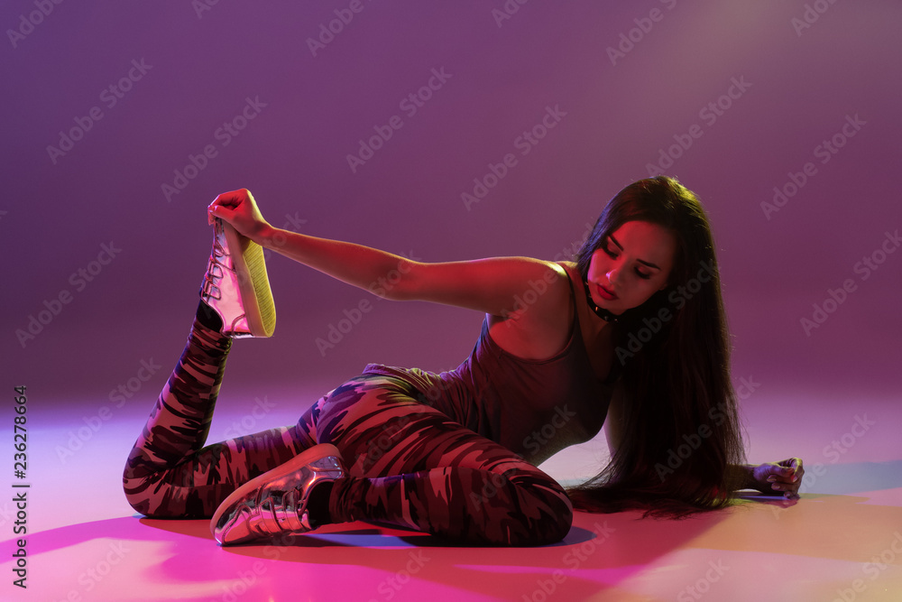 Attractive girl dancing twerk in the studio Stock Photo | Adobe Stock
