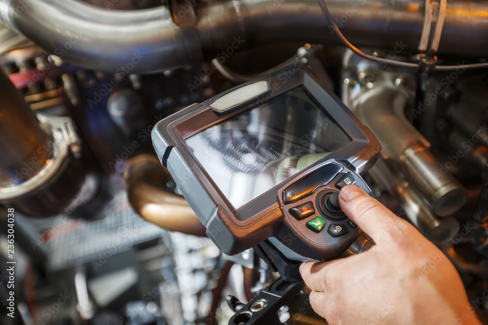 Inspection of a gas turbine engine using a Video Endoscope. Search for ...