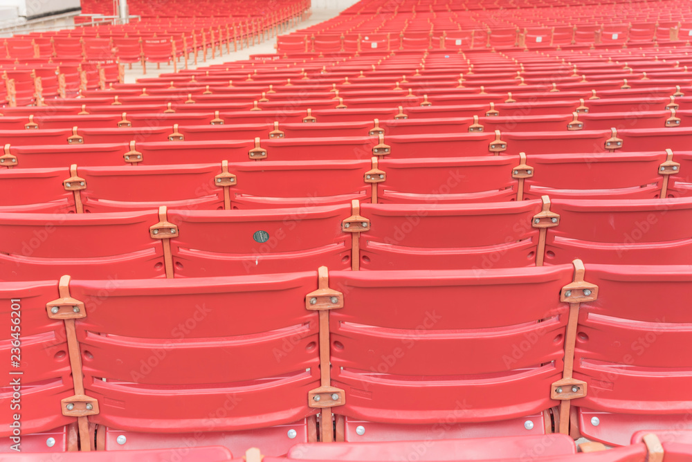Rear view line of raised orchestra level seats from public outdoor ...