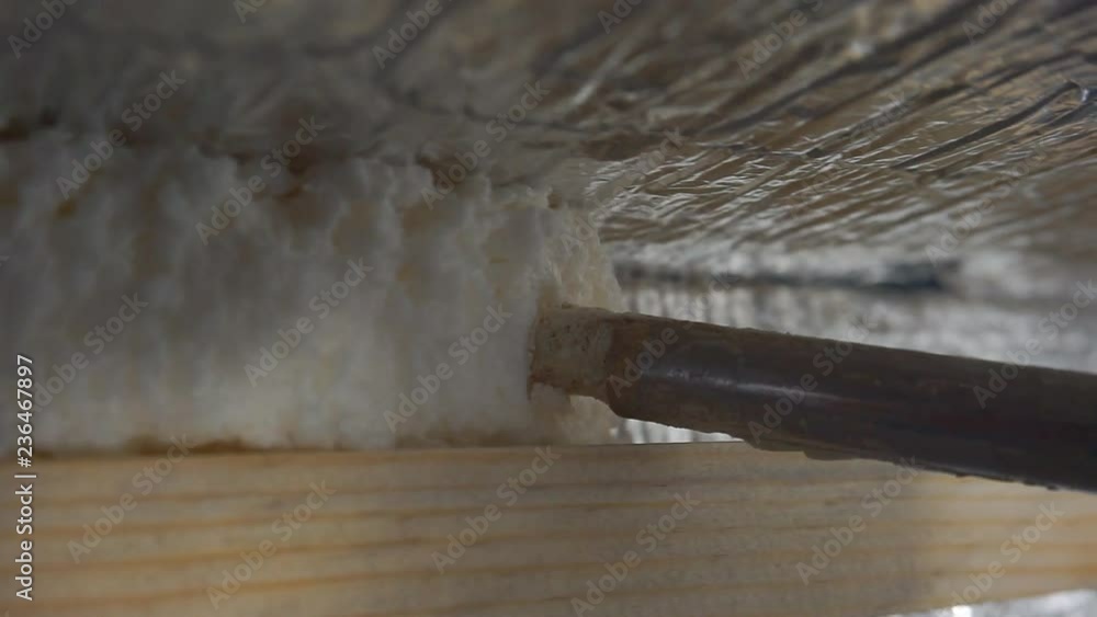 Vídeo do Stock: Nozzle of construction gun fills space under window ...